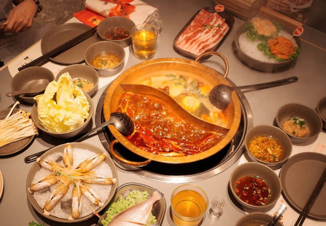 Uncle Fong Hotpot: Where Singapore Meets China's Viral Chicken Tower Trend